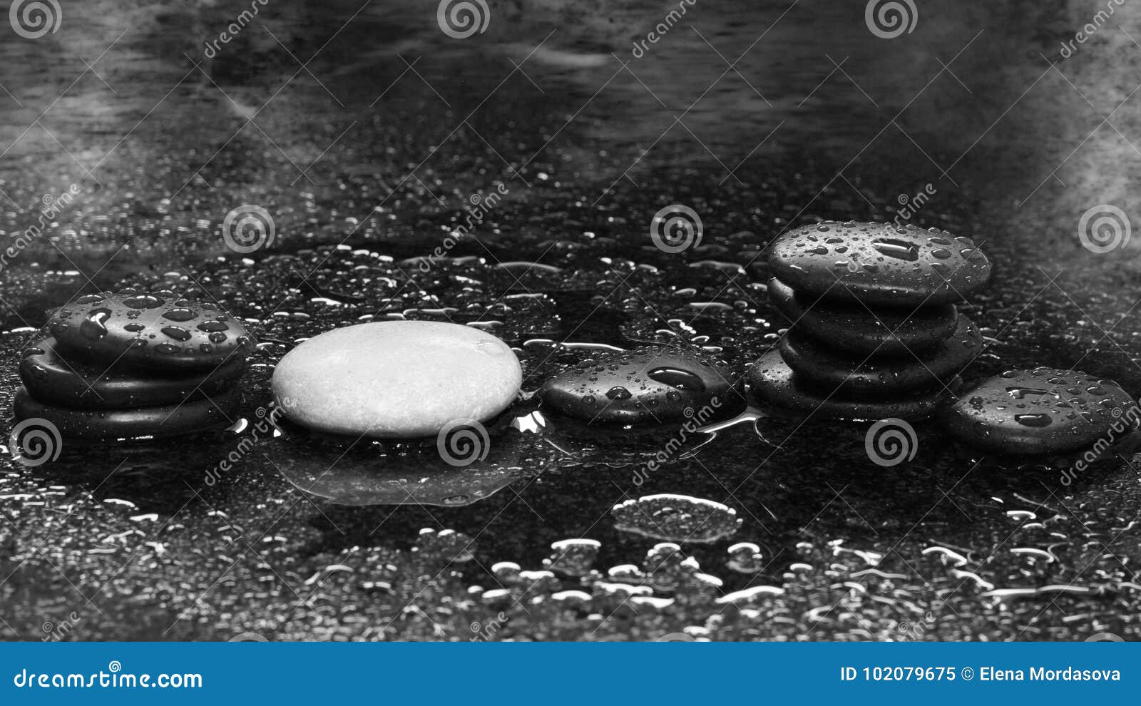 Spa Stones on a Dark Background with Water Drops and Reflection Stock ...