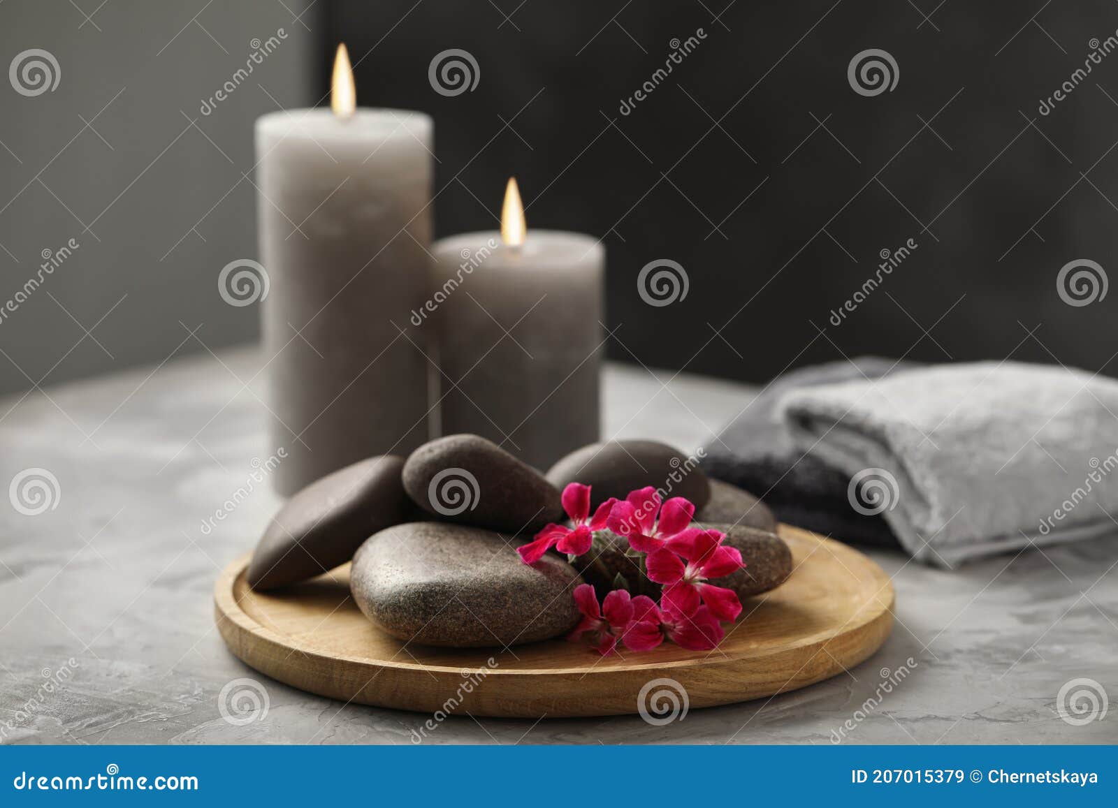 Spa Stones and Red Flowers on Grey Table Stock Image - Image of organic ...