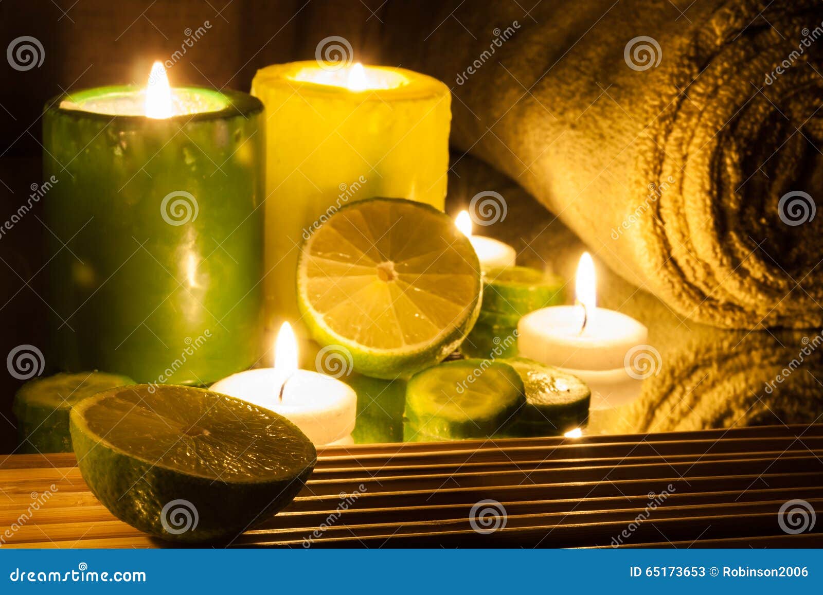 Spa And Wellness Setting Green And Yellow Candles Lit Lemon Green
