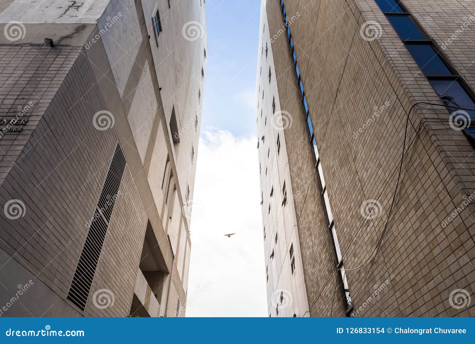 Space between buildings stock photo. Image of blue, window - 126833154