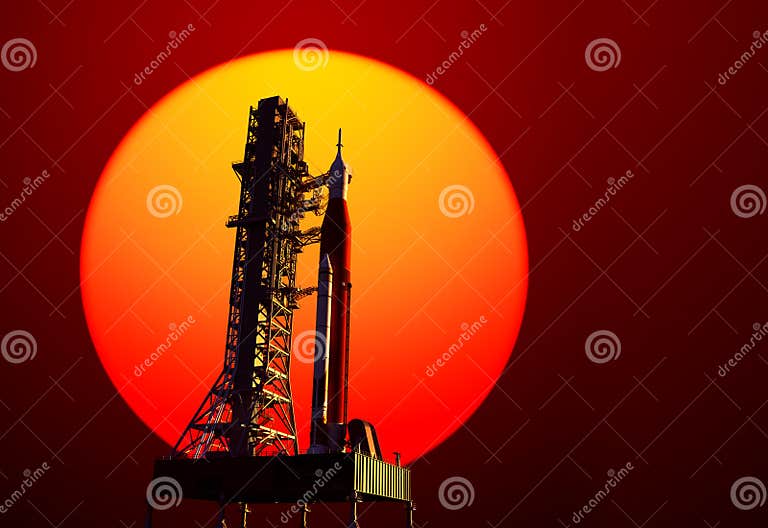 Space Launch System on Launchpad on Background of Red Sun Stock ...