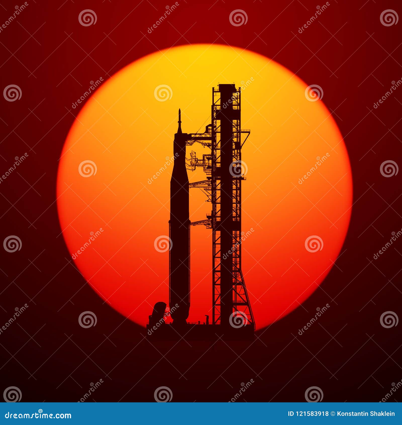 Space Launch System on Launchpad Over Background of Red Sun Stock ...