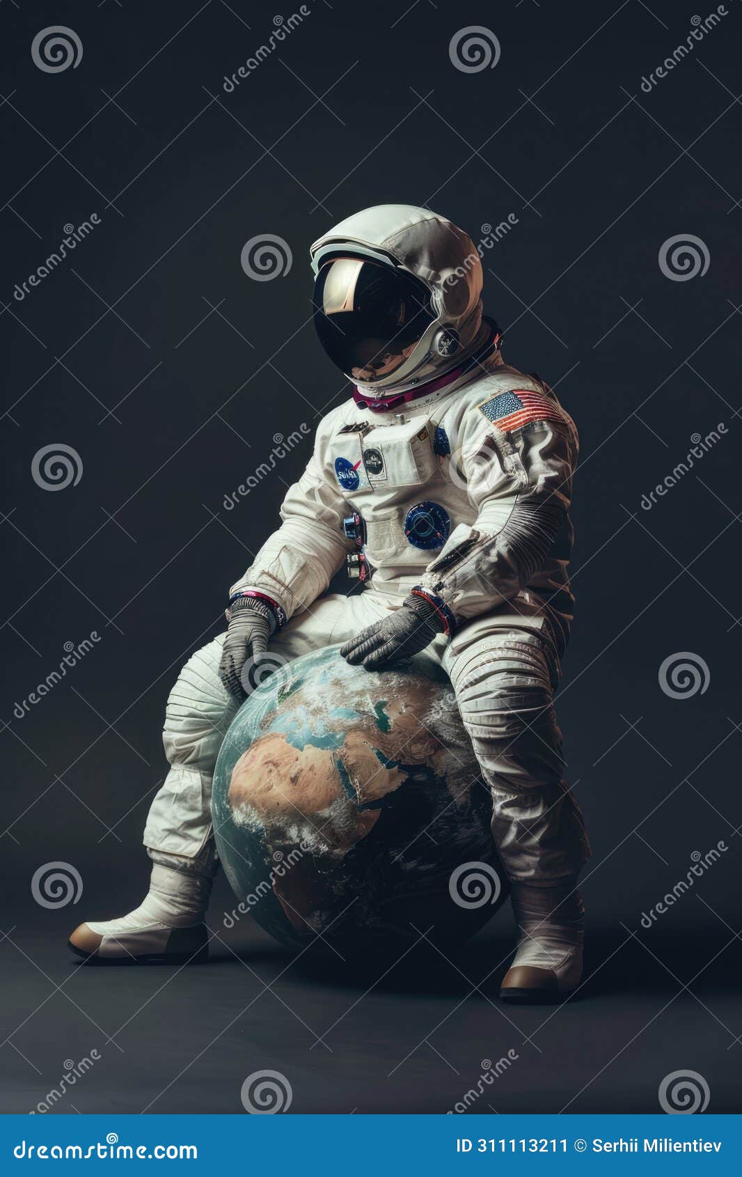 Spaceman in Spacesuit Sits on Planet Earth Globe. Astronaut in Studio ...