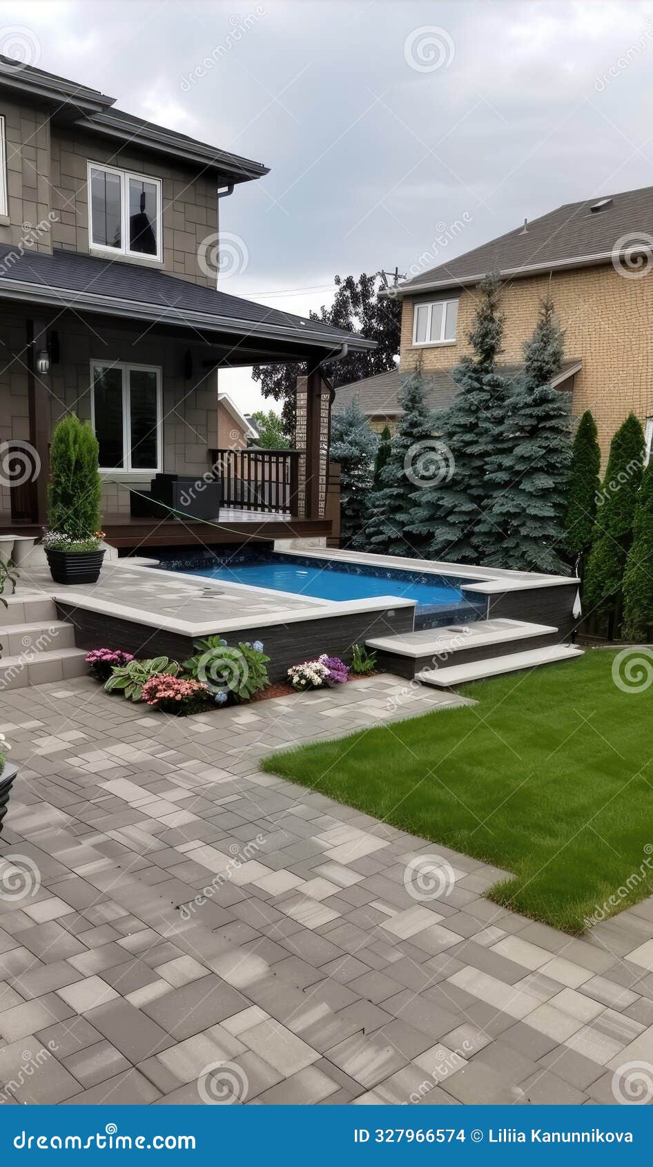 A Spacious Backyard Features a Large, Rectangular Swimming Pool with a Stone Patio, a Covered ...