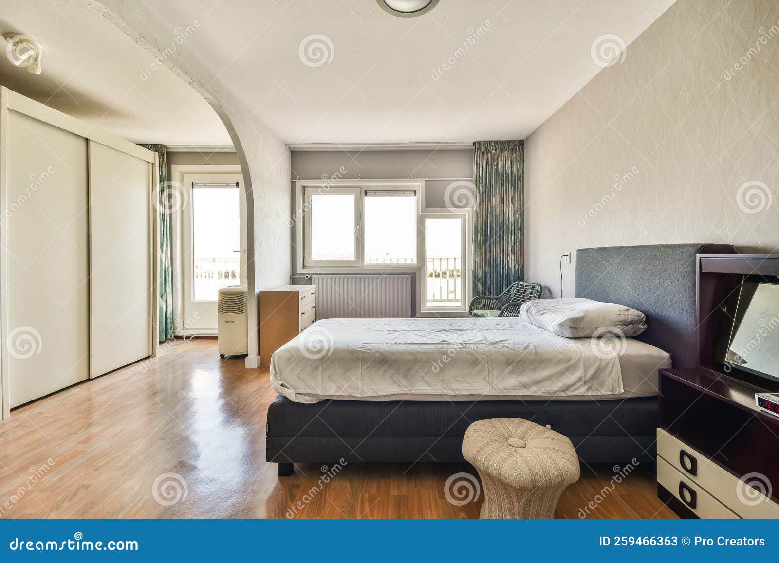 Spacious Bedroom in Modern Flat Stock Image - Image of glow, flat ...