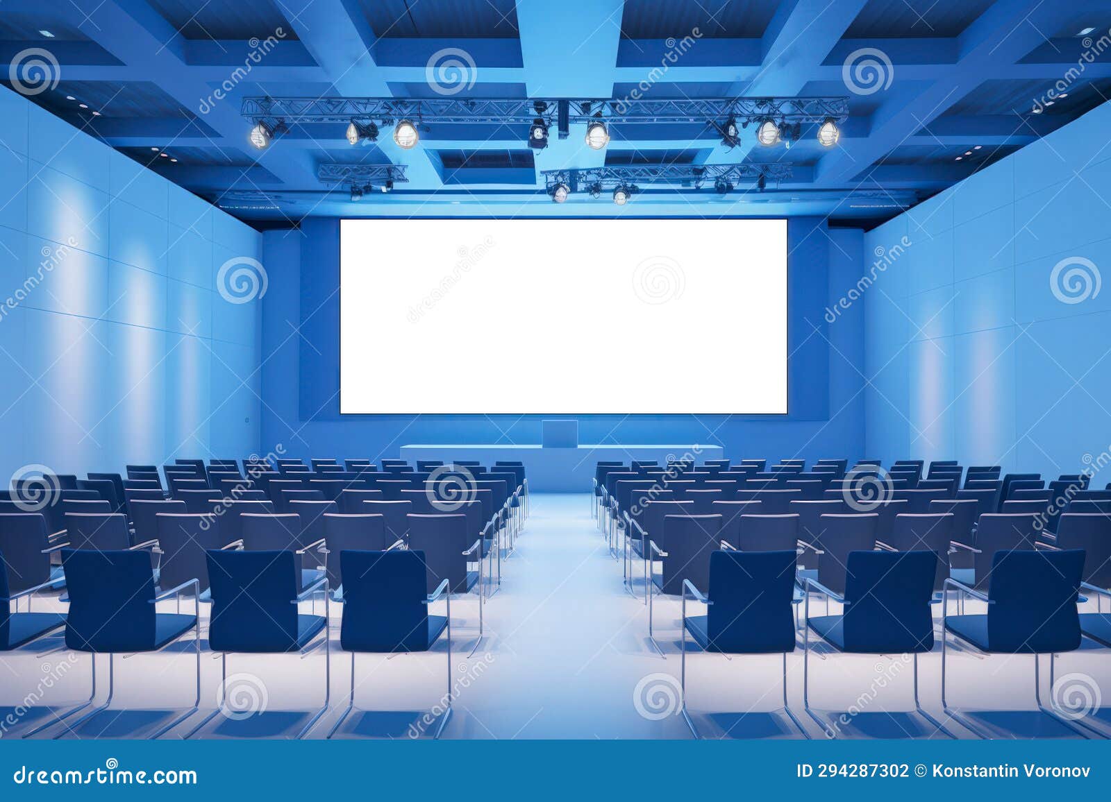 Spacious Blue-themed Conference Room with a Blank Screen, Rows of ...