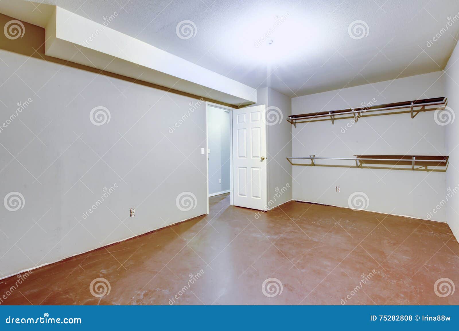 Spacious Empty Garage Interior with Two Shelves on the Wall. Stock ...