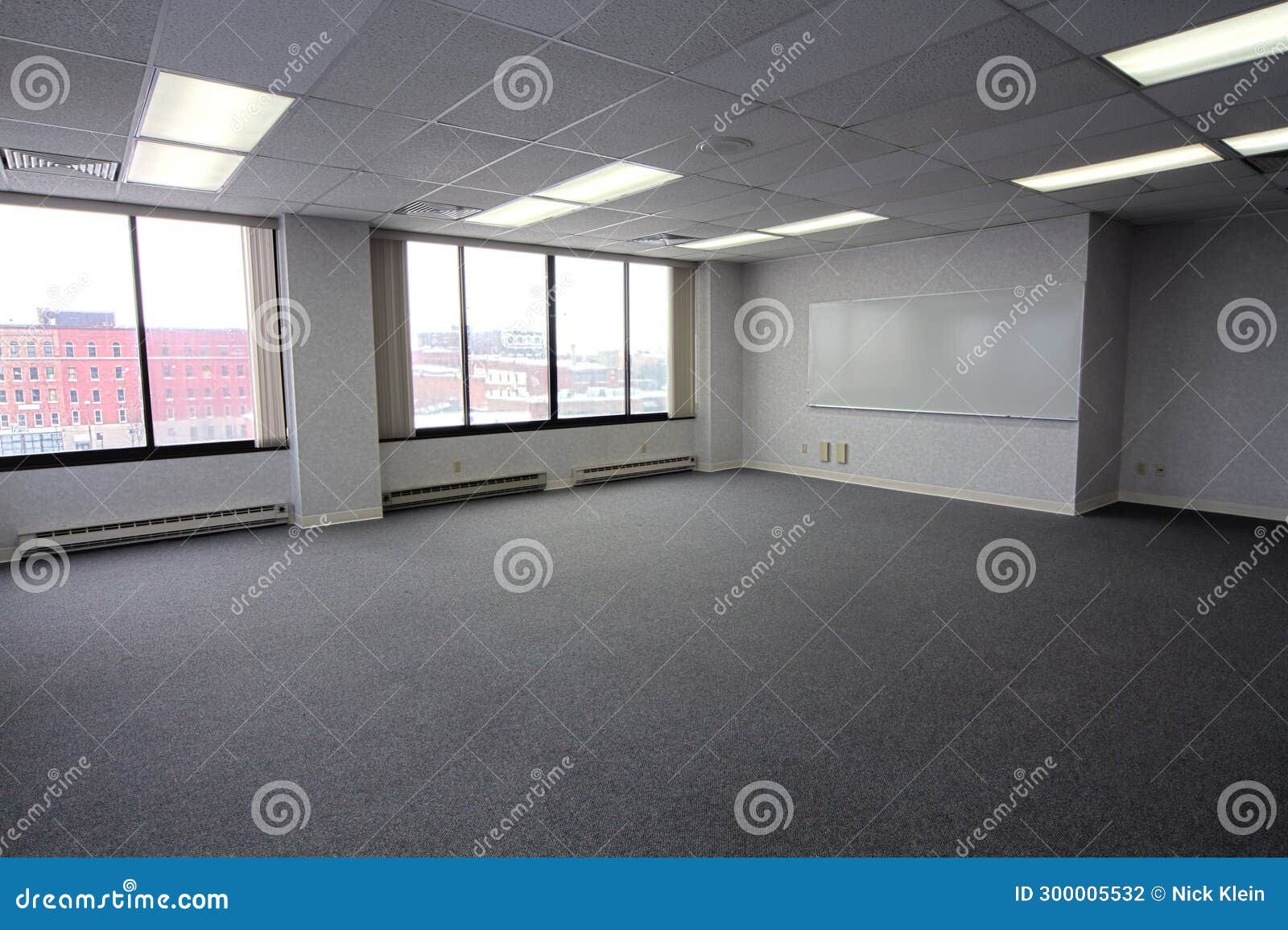 Spacious Empty Office Space with Urban View and Brainstorming Potential ...