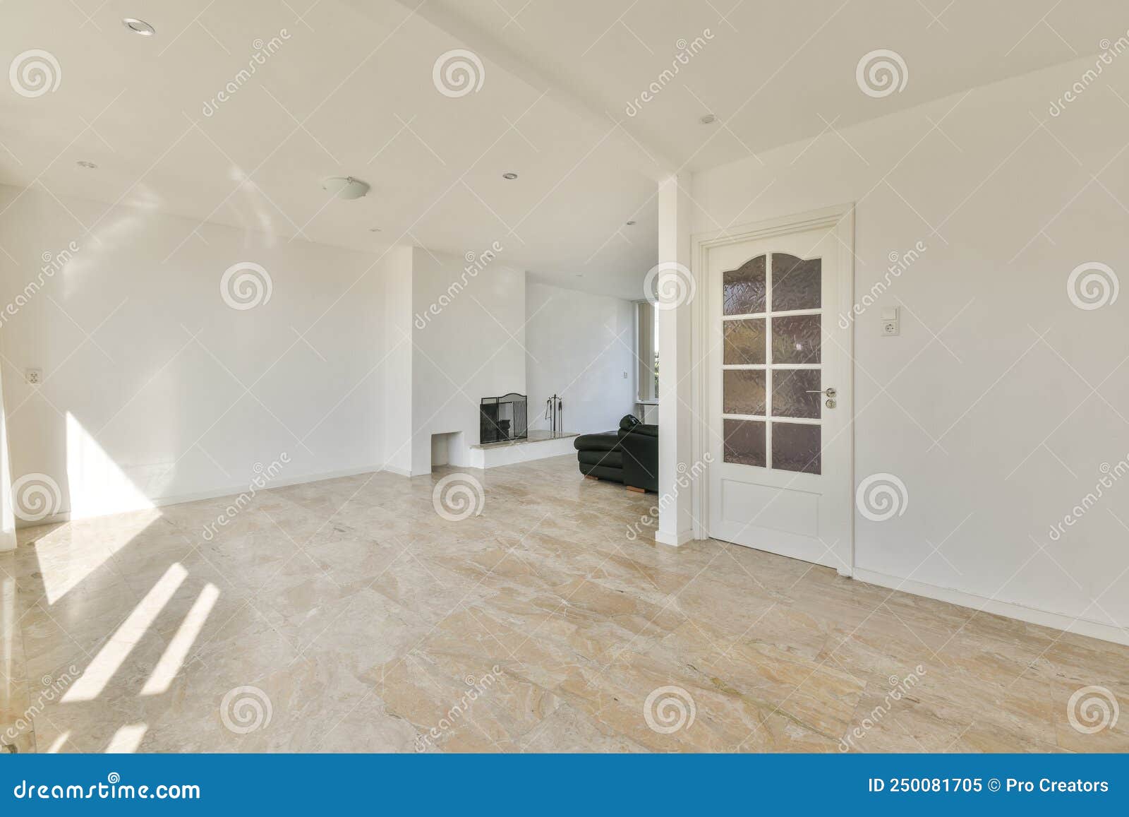 A Spacious Empty Room with a Sofa and Panoramic Windows Stock Image ...