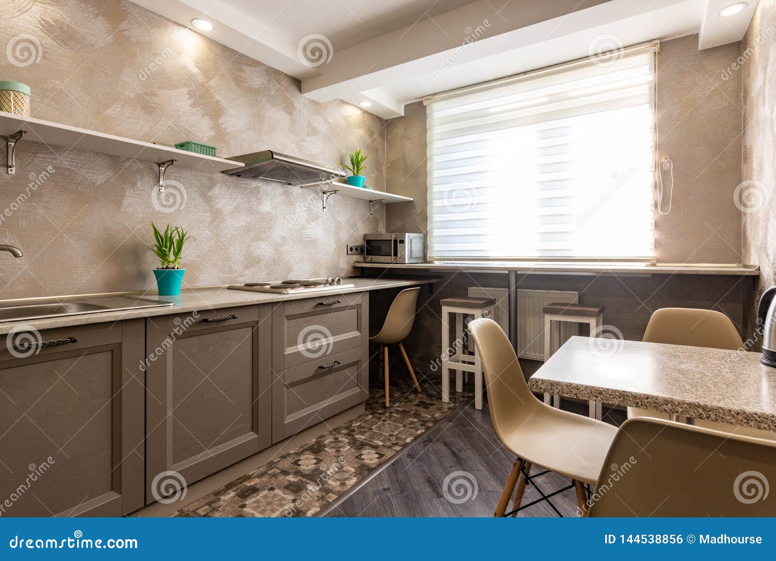 Spacious Kitchen in an Apartment High-rise Building Stock Photo - Image ...