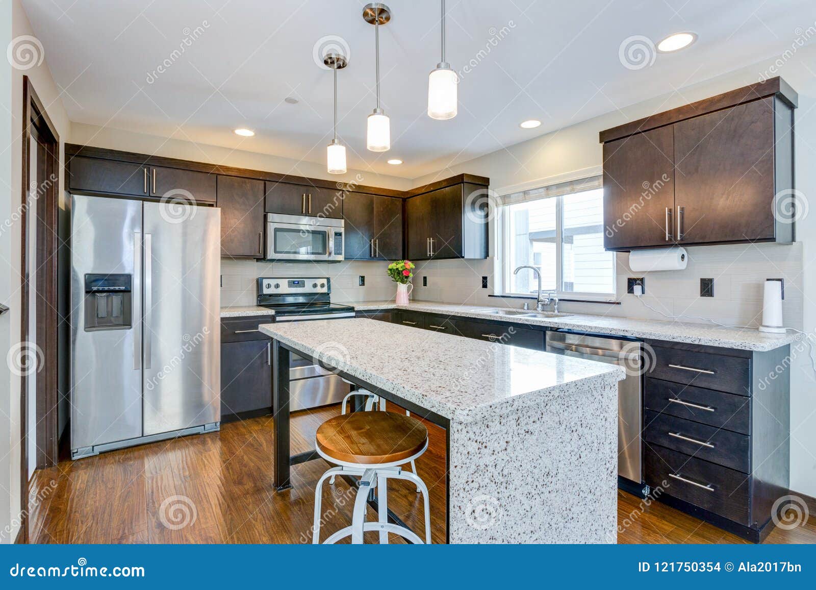 Spacious Kitchen with Chocolate Brown Cabinets Stock Photo - Image of ...