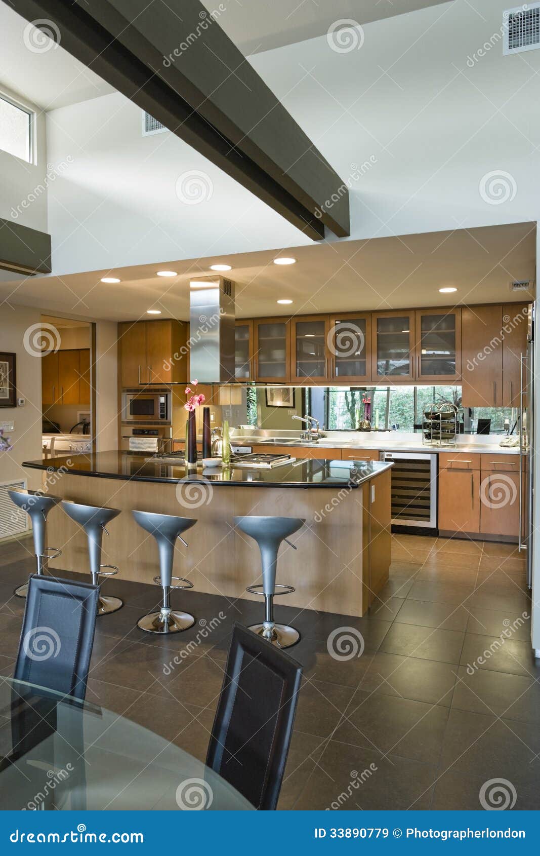 Spacious Kitchen with Stools at Island in House Stock Image - Image of ...