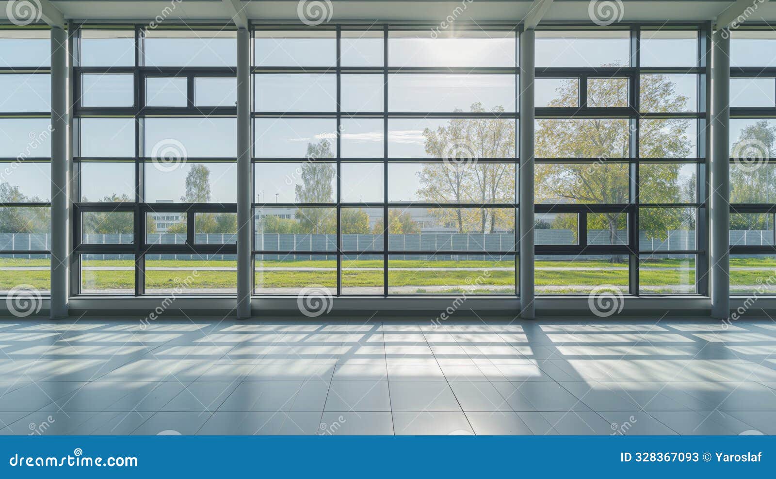 Spacious Modern Building Interior with Large Windows and Natural Light ...