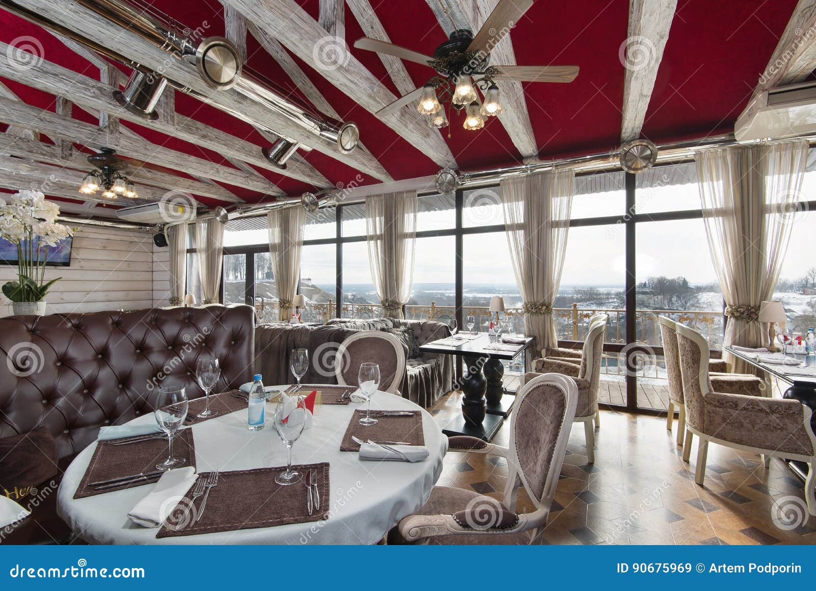 Spacious Restaurant with Large Panoramic Windows, a Leather Sofa ...