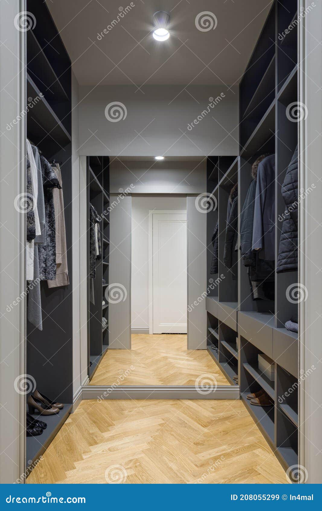 Spacious Walk in Closet with Mirror Wall Stock Image - Image of ...