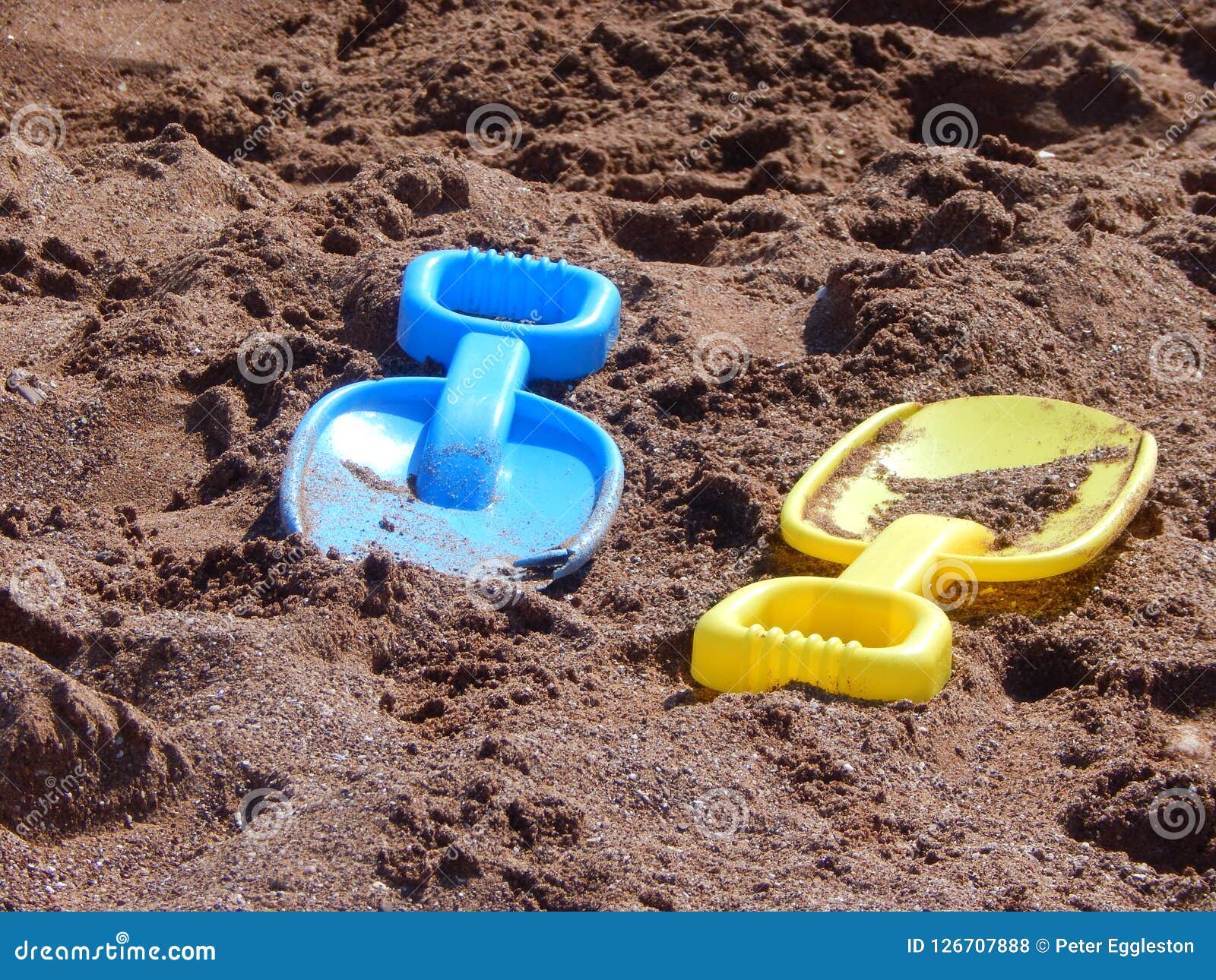 Spades on sandy beach stock photo. Image of greatbritain - 126707888