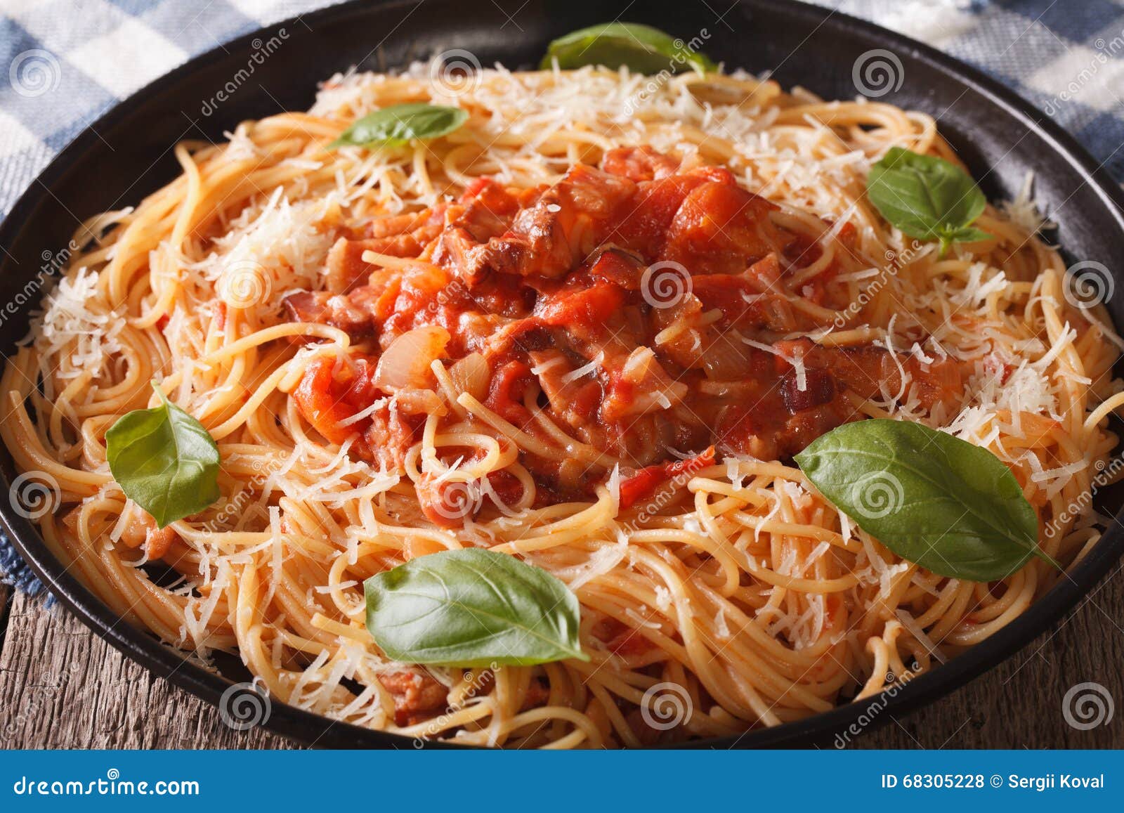 Spaghetti with Amatriciana Sauce Close-up on a Plate. Horizontal Stock ...