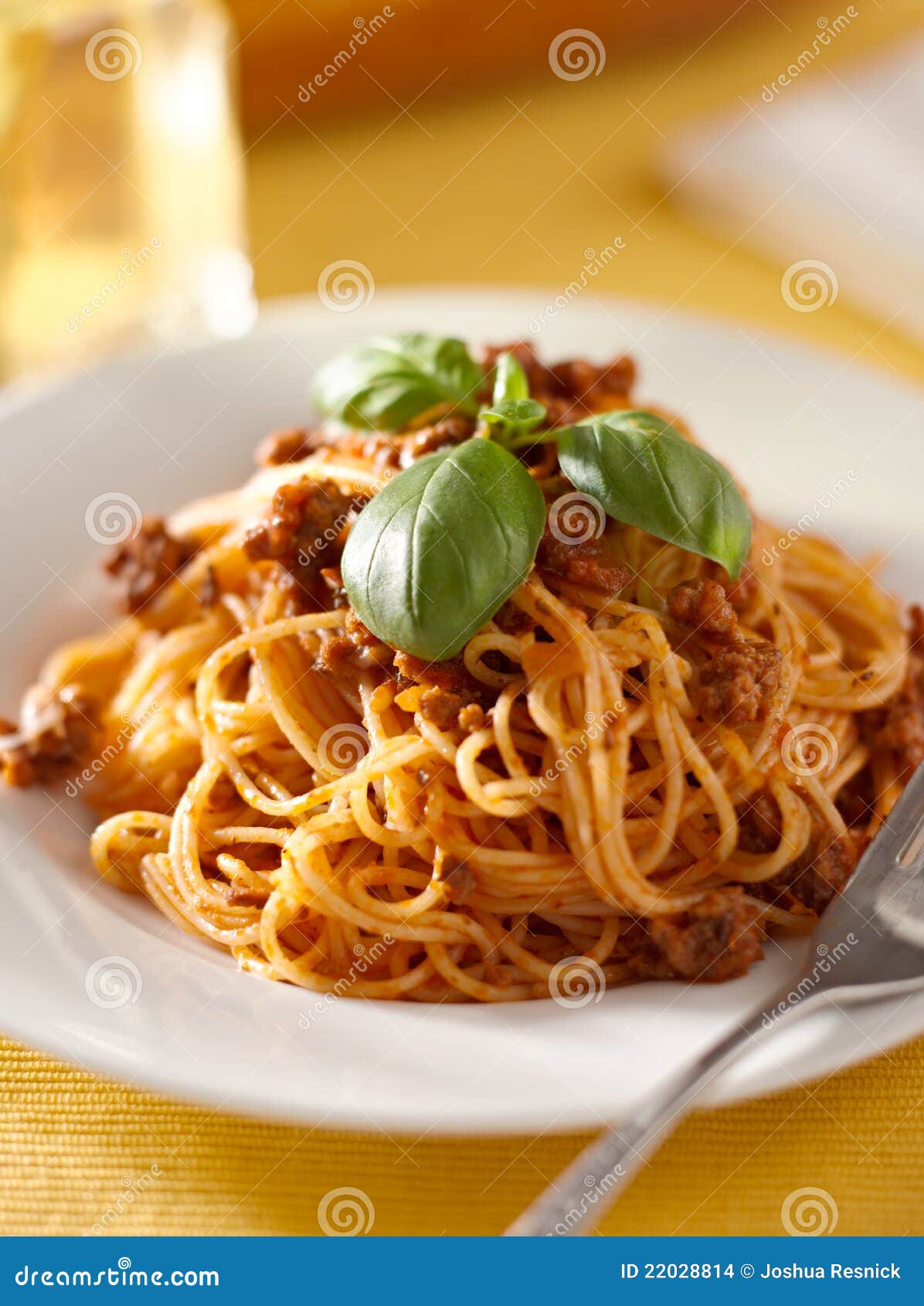 Spaghetti with Basil Garnish in Meat Sauce Stock Photo - Image of beef ...