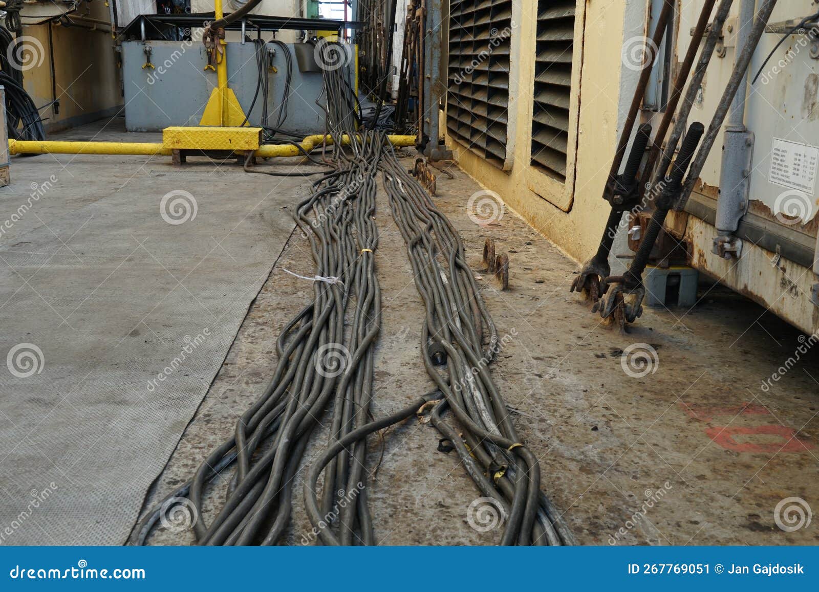 Spaghetti of Black Cables Extended on the Main Deck from White Reefer ...