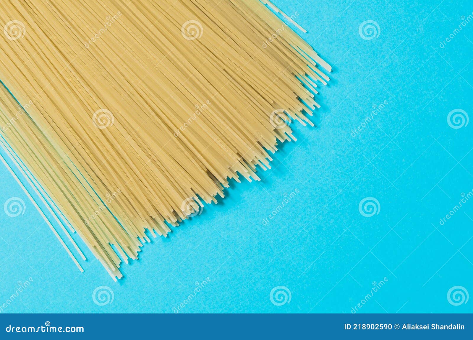 Spaghetti on a Blue Background. Stock Photo - Image of spaghetti, blue ...