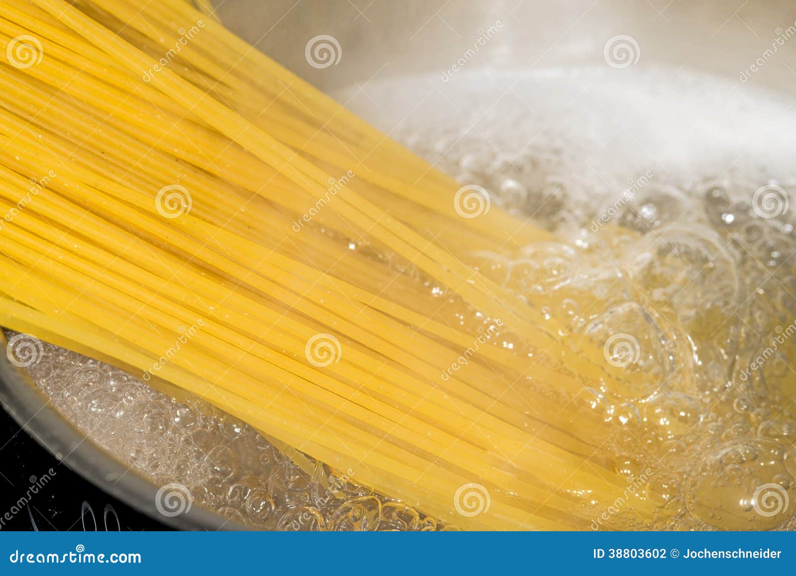 Spaghetti in boiling water stock photo. Image of cook - 38803602