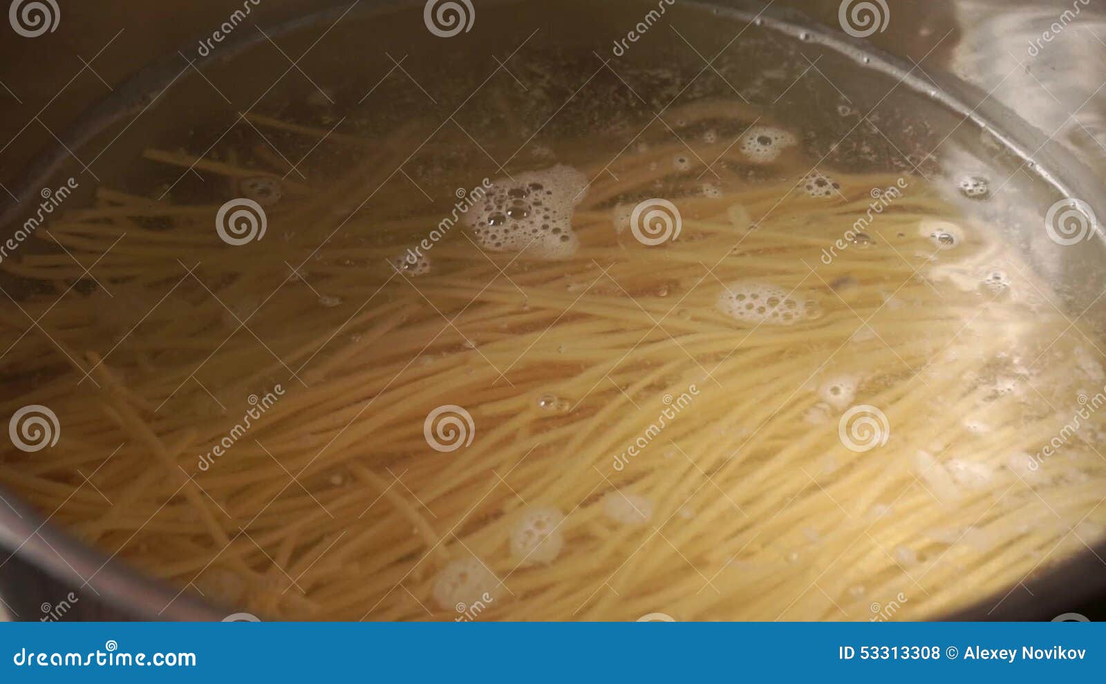 Spaghetti in boiling water stock footage. Video of detail - 53313308