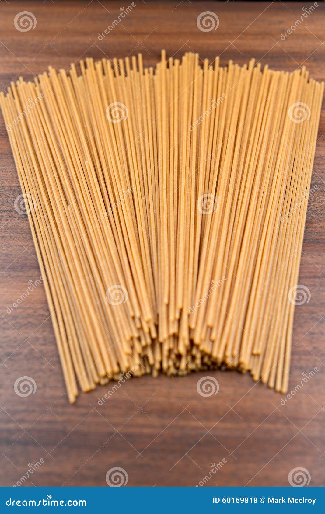 Spaghetti on brown table stock photo. Image of spaghetti - 60169818