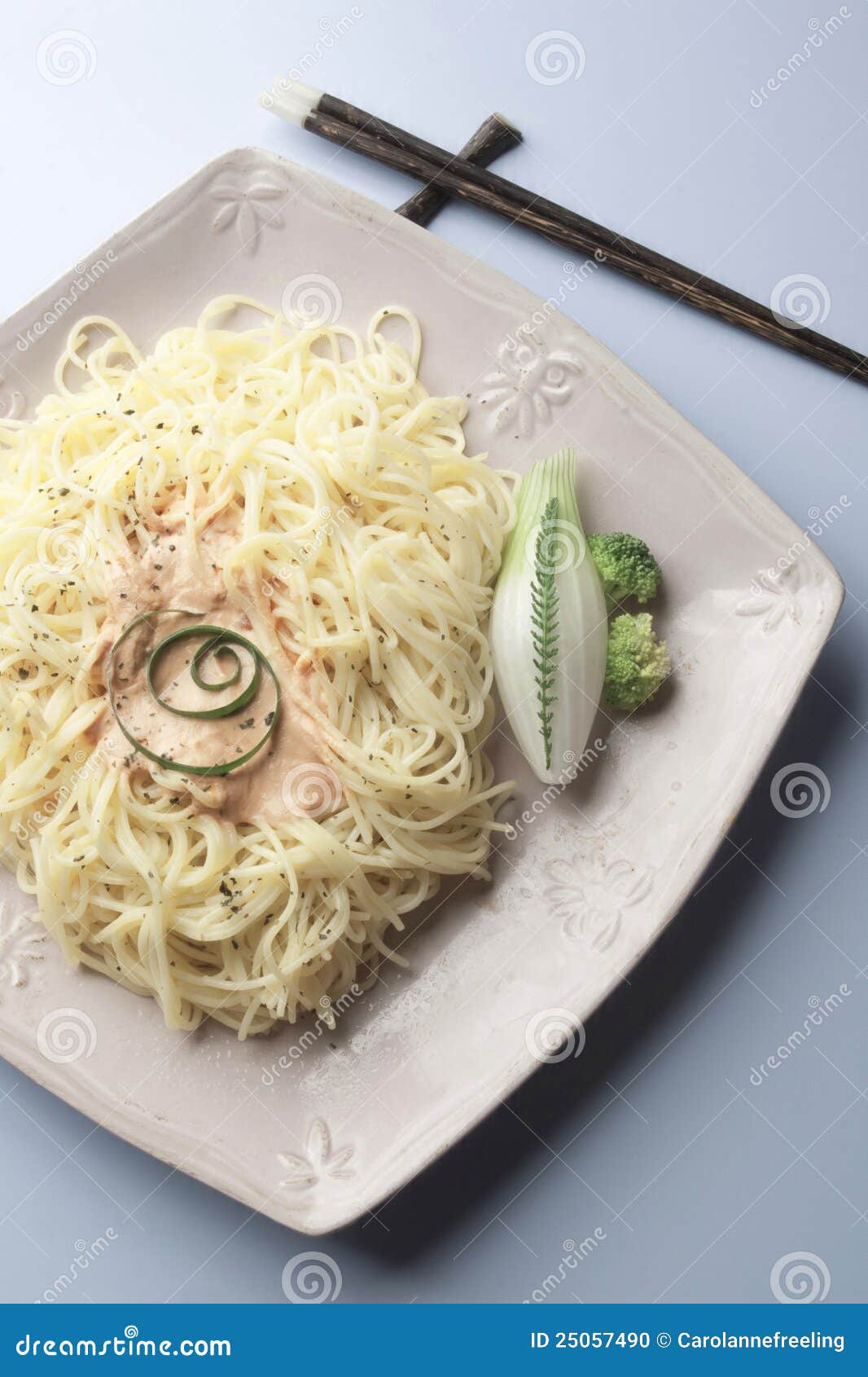 Spaghetti with chop sticks stock photo. Image of eating - 25057490