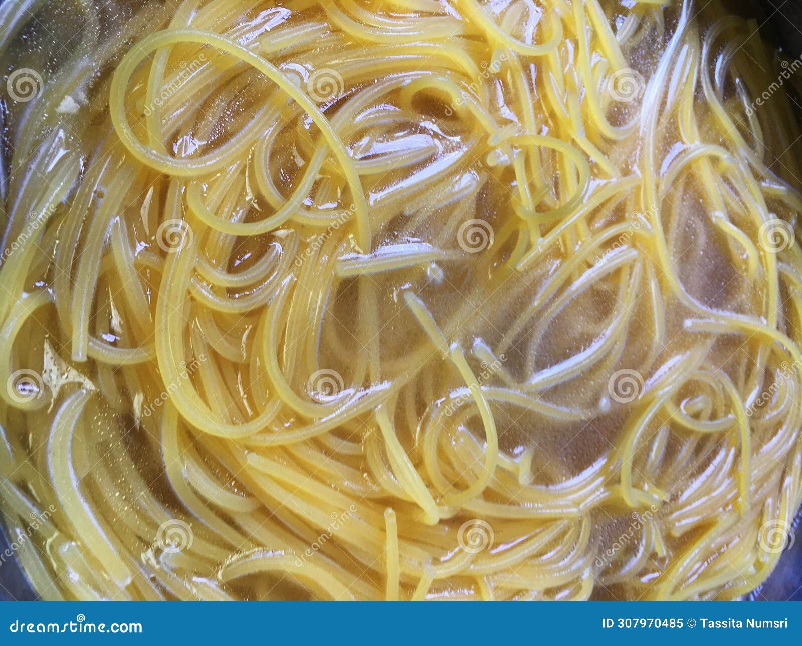 Spaghetti Cooking in Boiling Water in Pot on Stove Stock Image - Image ...