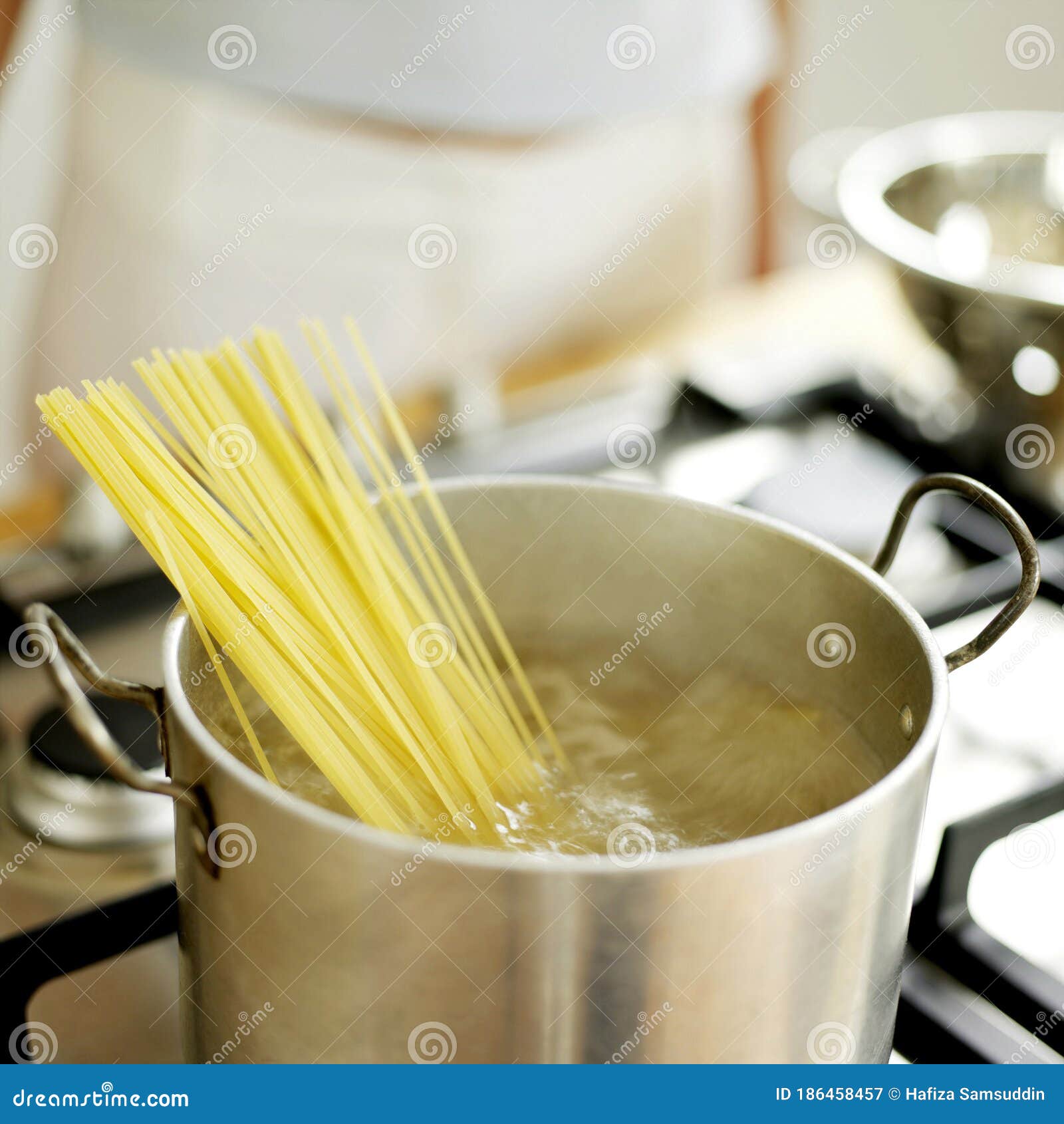 Spaghetti cooking in pan stock image. Image of feast - 186458457
