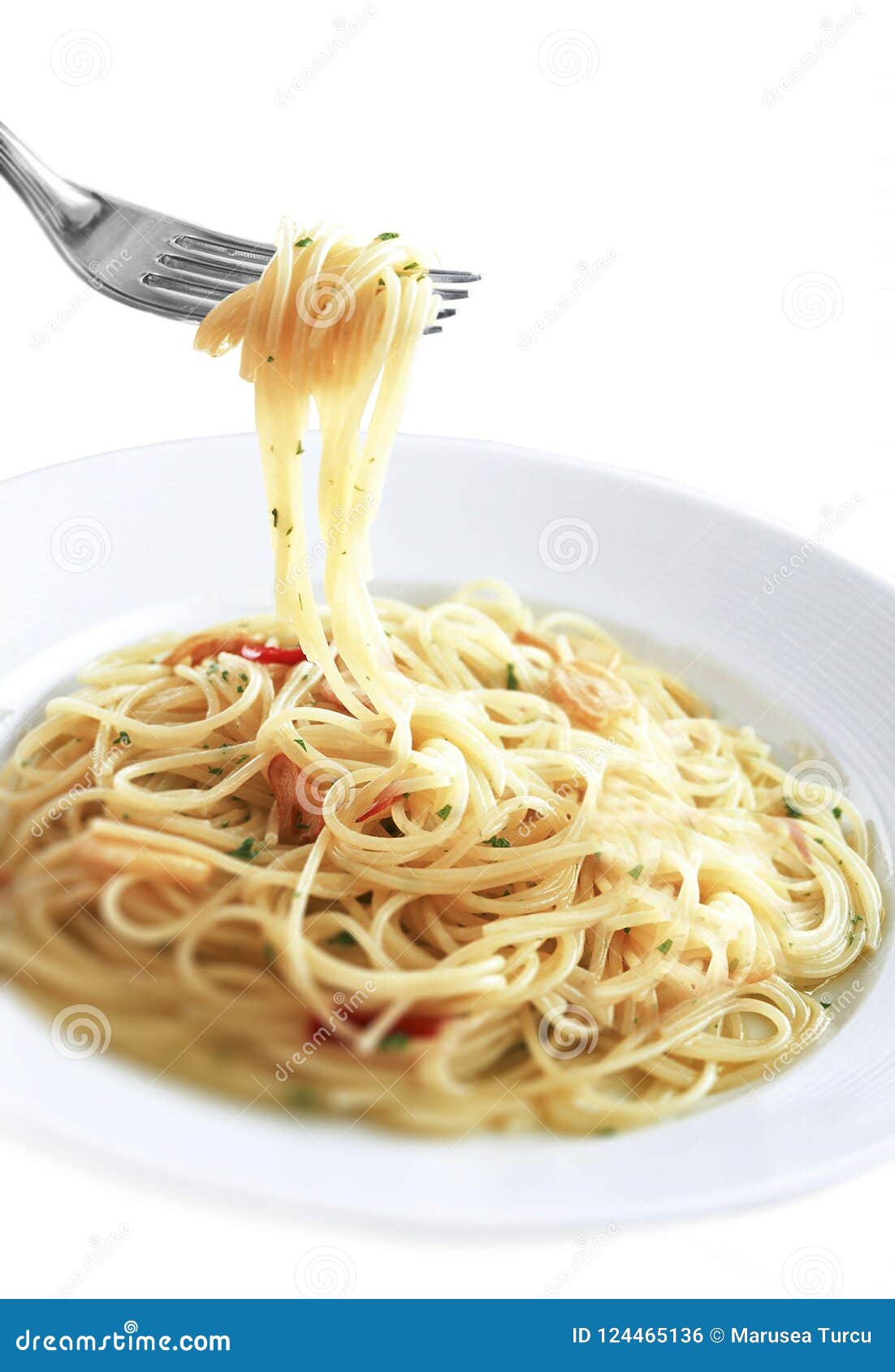 Spaghetti on fork close-up stock photo. Image of mediterranean - 124465136