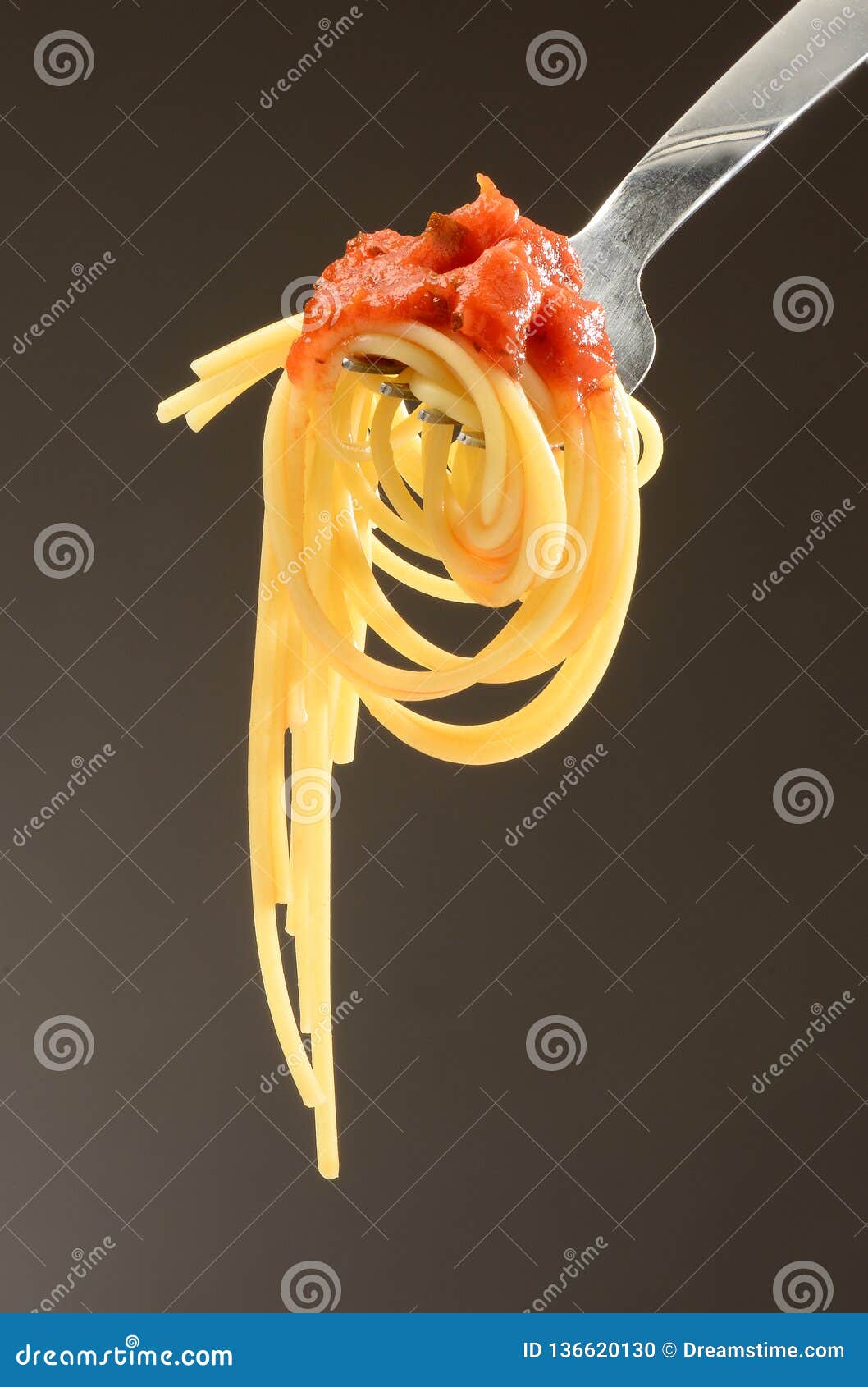 Spaghetti on a fork stock photo. Image of fork, tomaotoe - 136620130