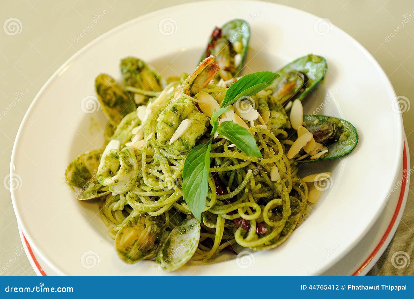 Spaghetti Genovese with Seafood Stock Photo - Image of cutlery ...
