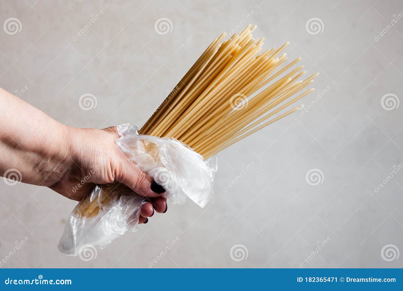 Spaghetti in hand stock image. Image of cook, ingredient - 182365471