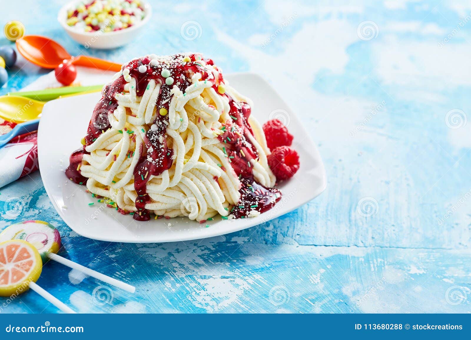 Spaghetti Ice Cream with Raspberry Sauce Stock Photo - Image of ...