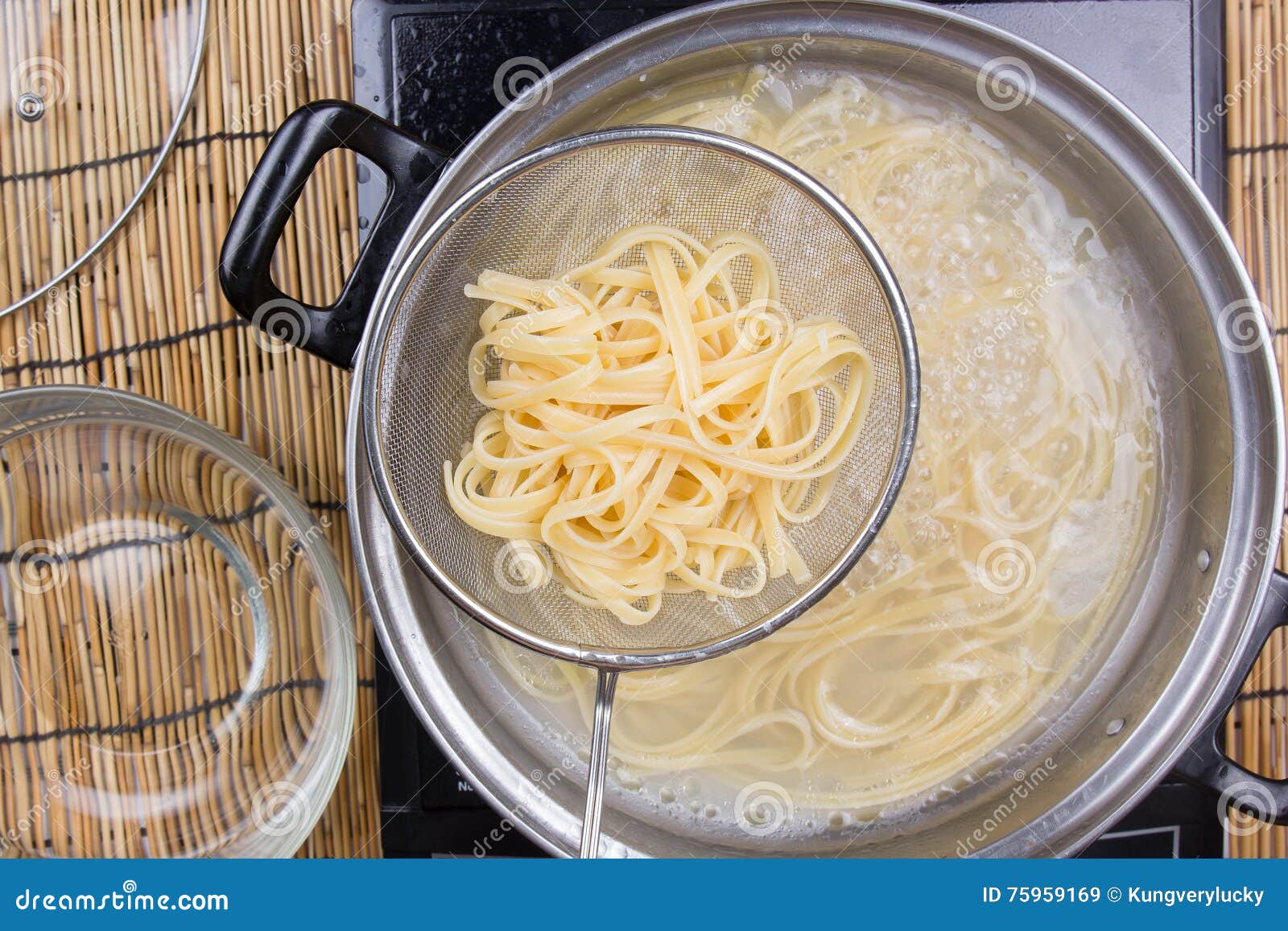 Spaghetti Lifted on of Cold Water with Colander Stock Image - Image of ...