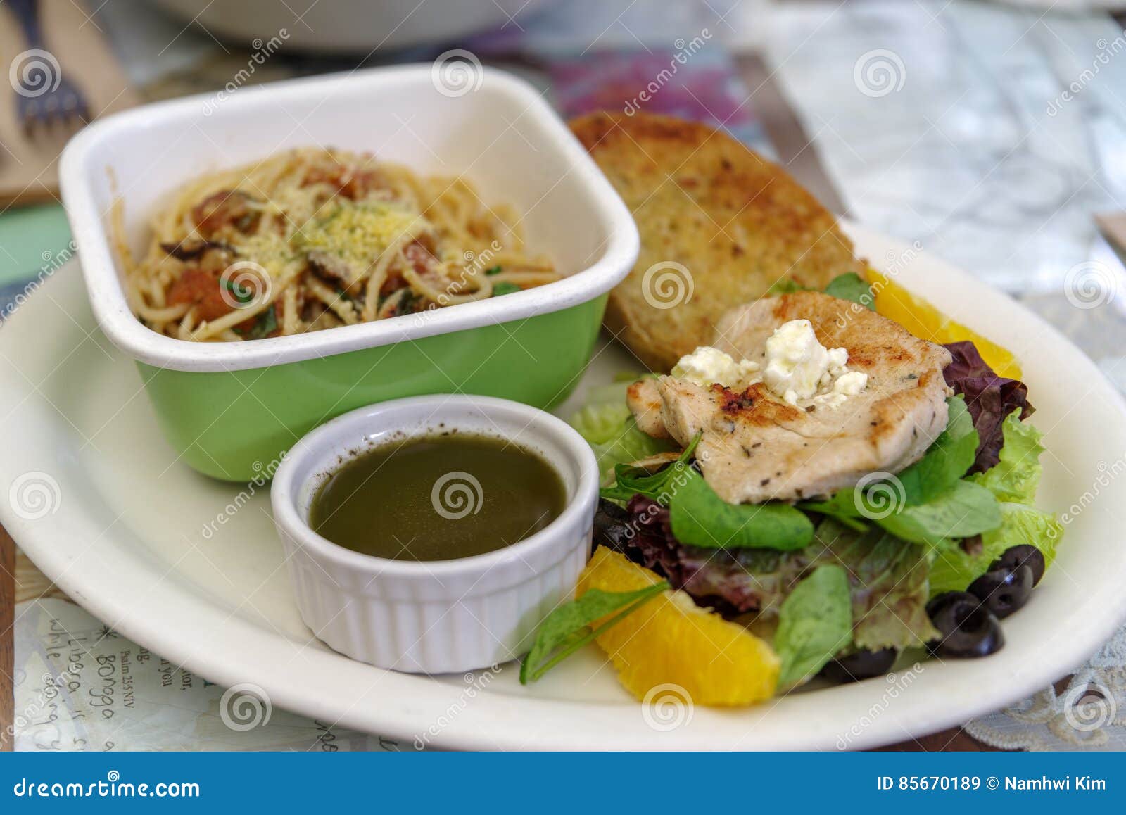 Spaghetti , Mixed Green Salad and Chicken Lunch Set Stock Image - Image ...