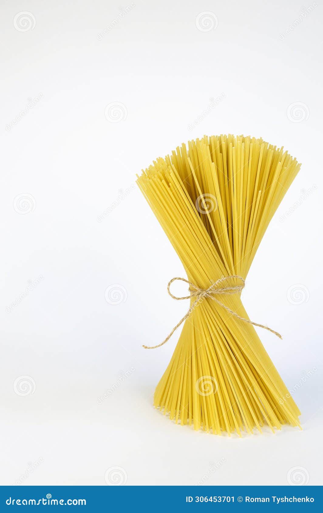 Spaghetti Pasta, a Bundle of Pasta Tied with Linen Thread. the Concept ...