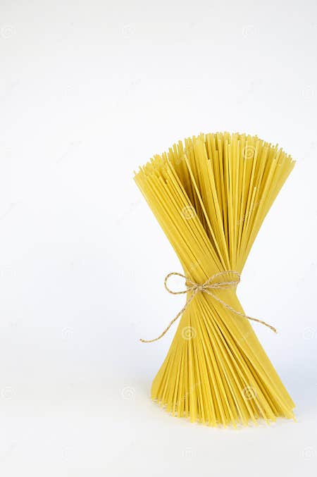Spaghetti Pasta, a Bundle of Pasta Tied with Linen Thread. the Concept ...