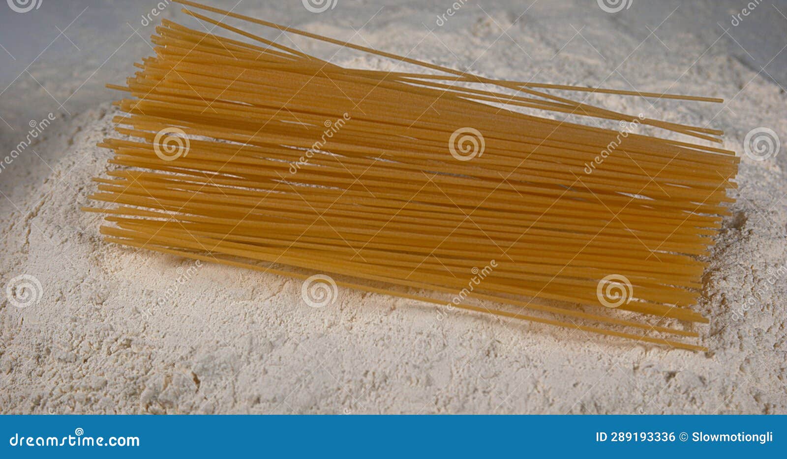 Spaghetti Pasta Falling on Flour Stock Photo - Image of pasta, indoors ...