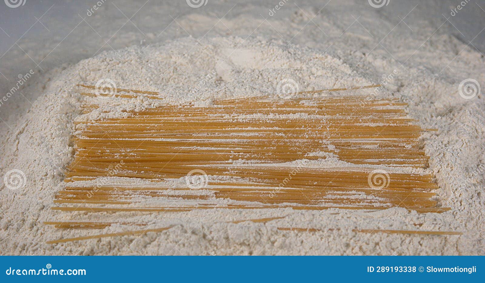 Spaghetti Pasta Falling on Flour Stock Photo - Image of wellbalanced ...