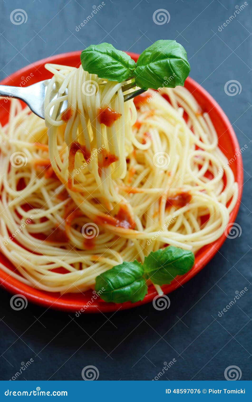 Spaghetti Pasta with Tomato Sauce and Garnish Stock Photo - Image of ...