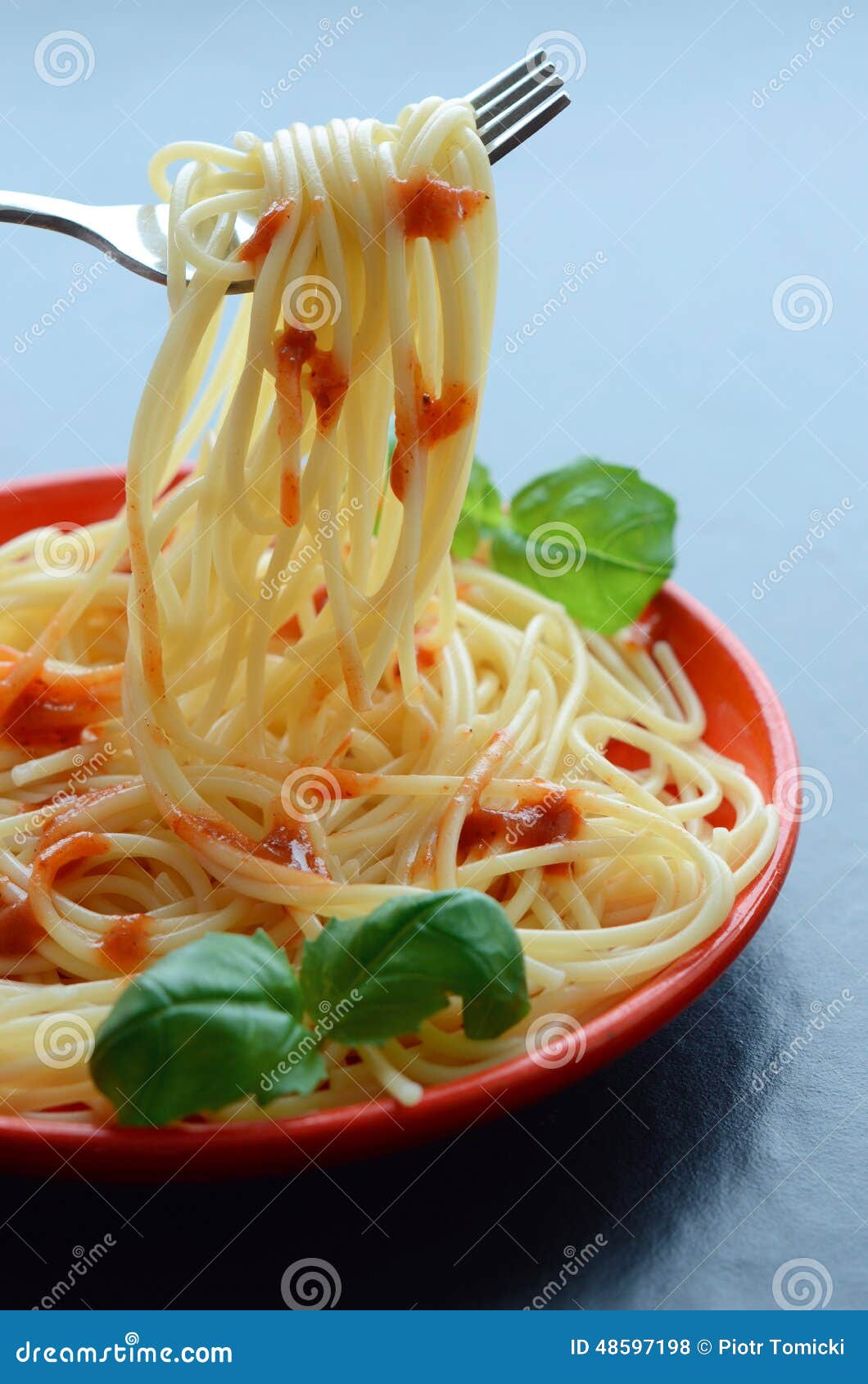 Spaghetti Pasta with Tomato Sauce and Garnish Stock Photo - Image of ...