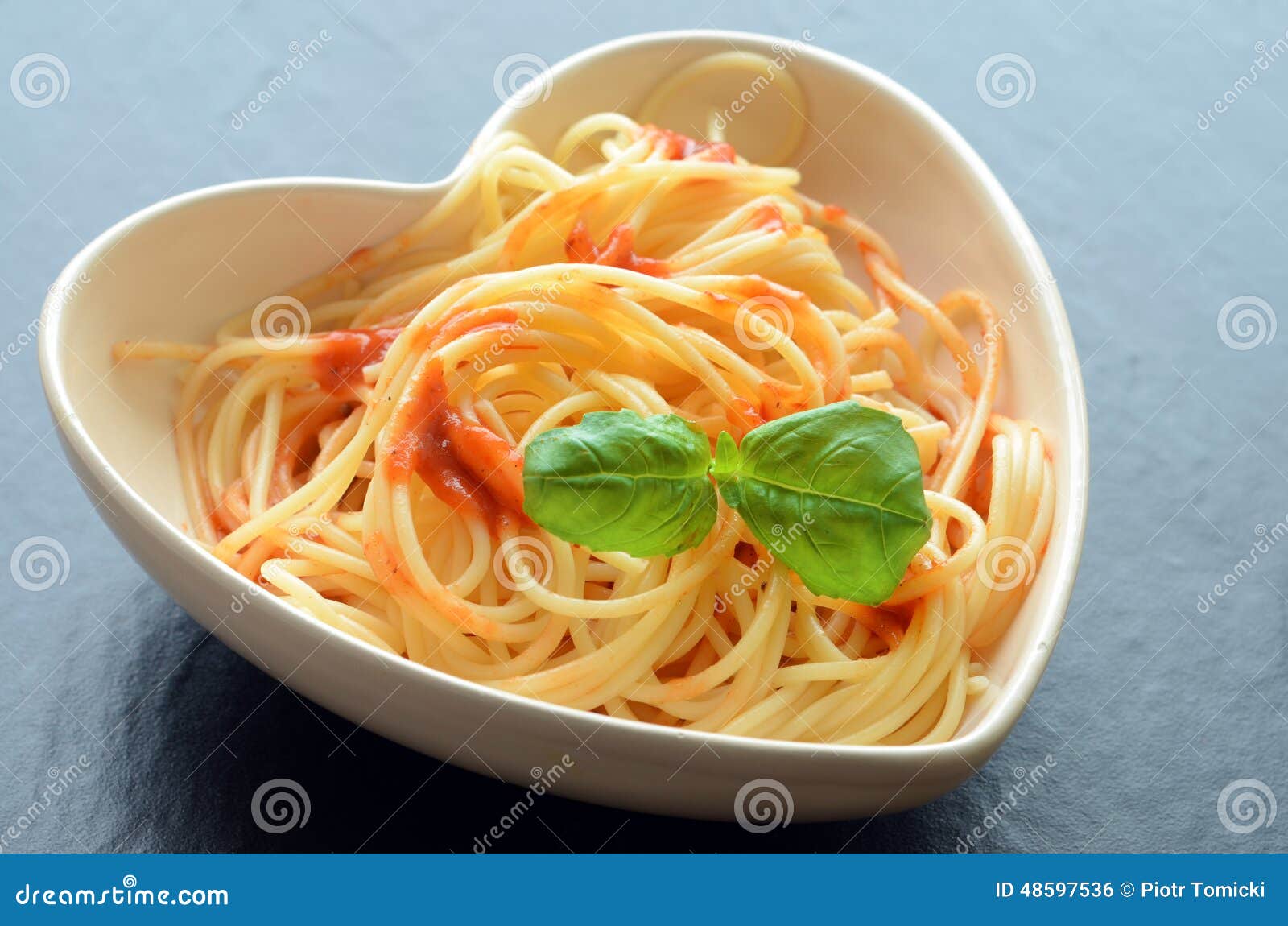 Spaghetti Pasta with Tomato Sauce and Garnish Stock Photo - Image of ...