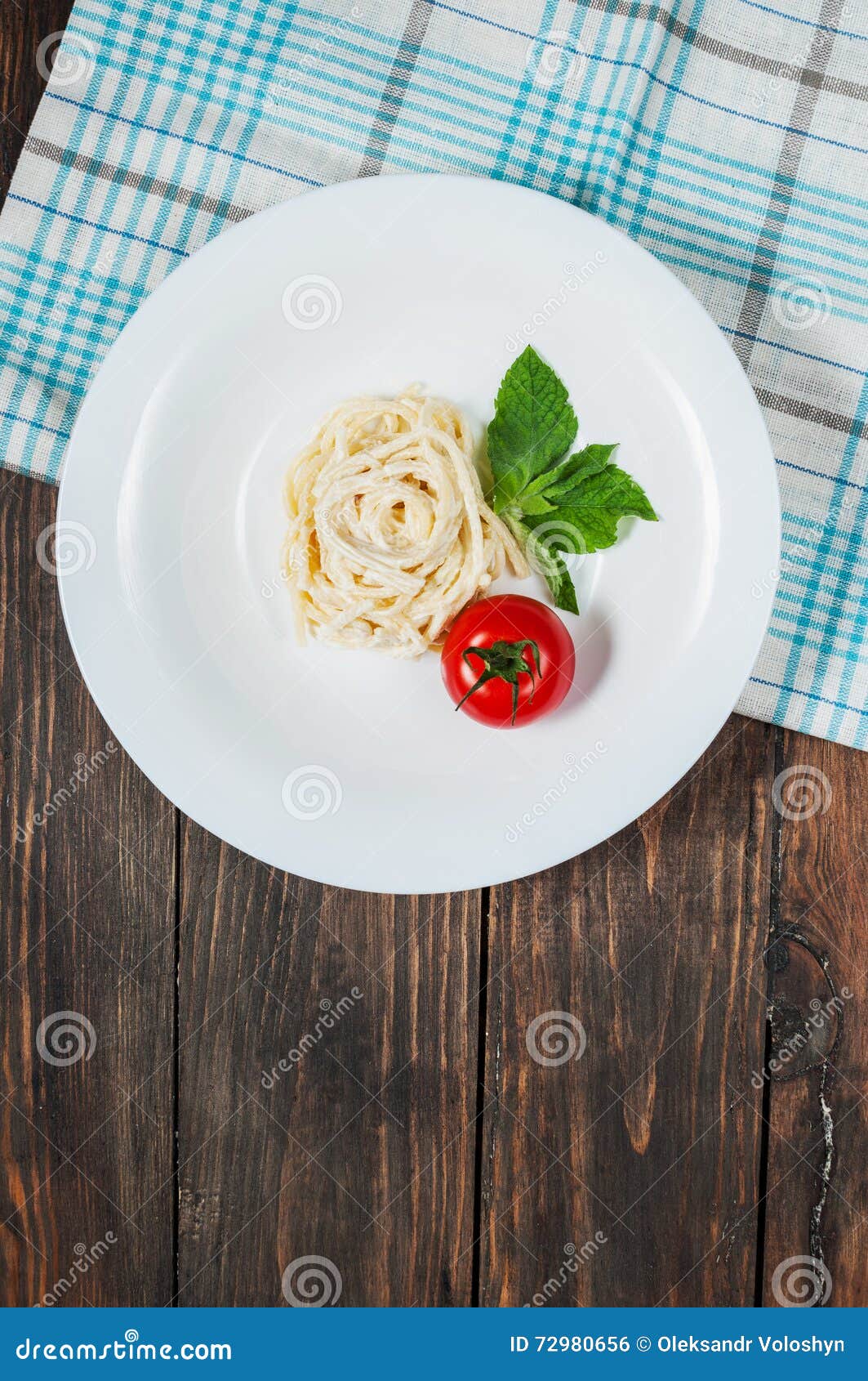 Spaghetti Pasta with Tomatoes on Wooden Table. Top View Stock Photo ...