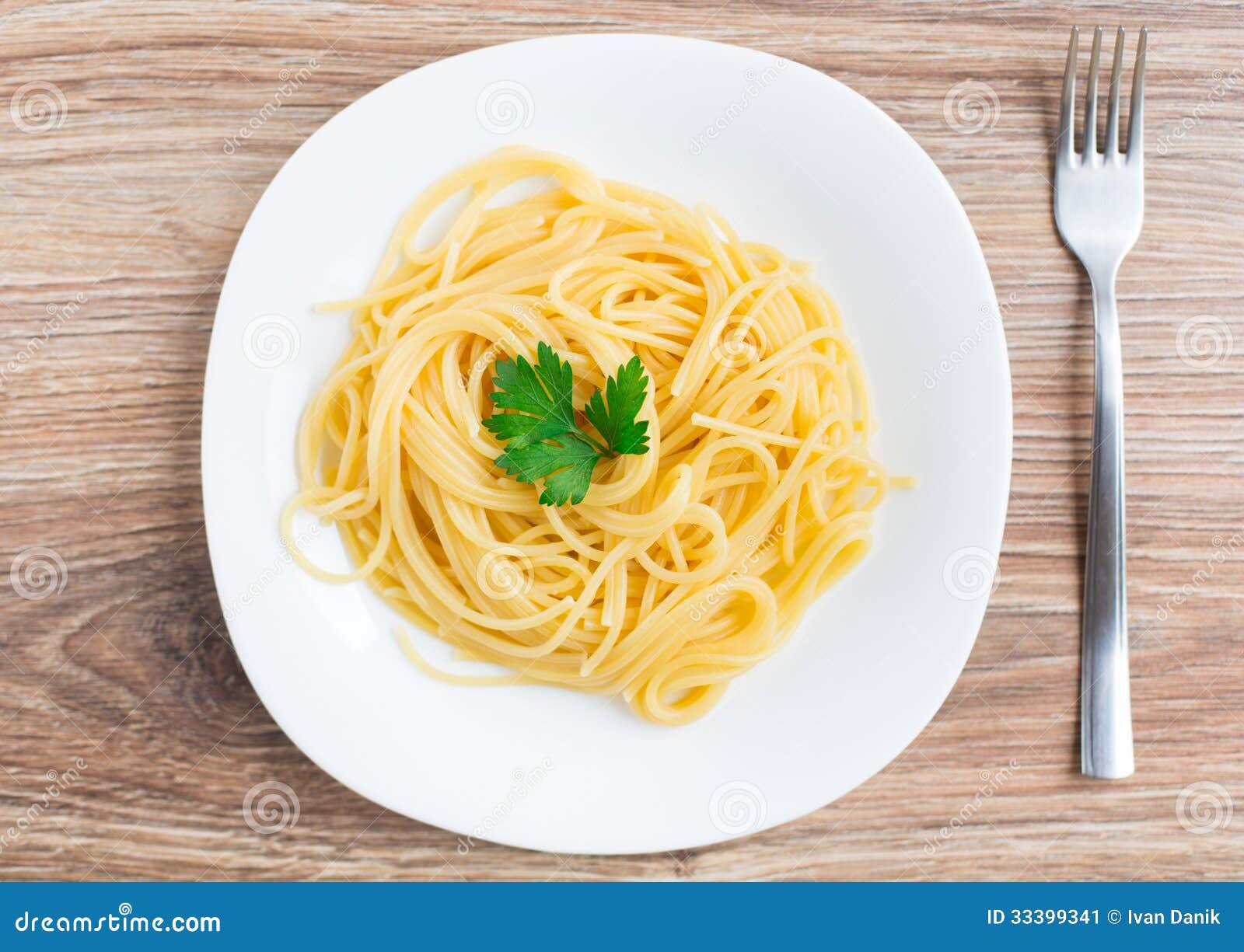 Spaghetti on a plate stock image. Image of parsley, restaurant - 33399341