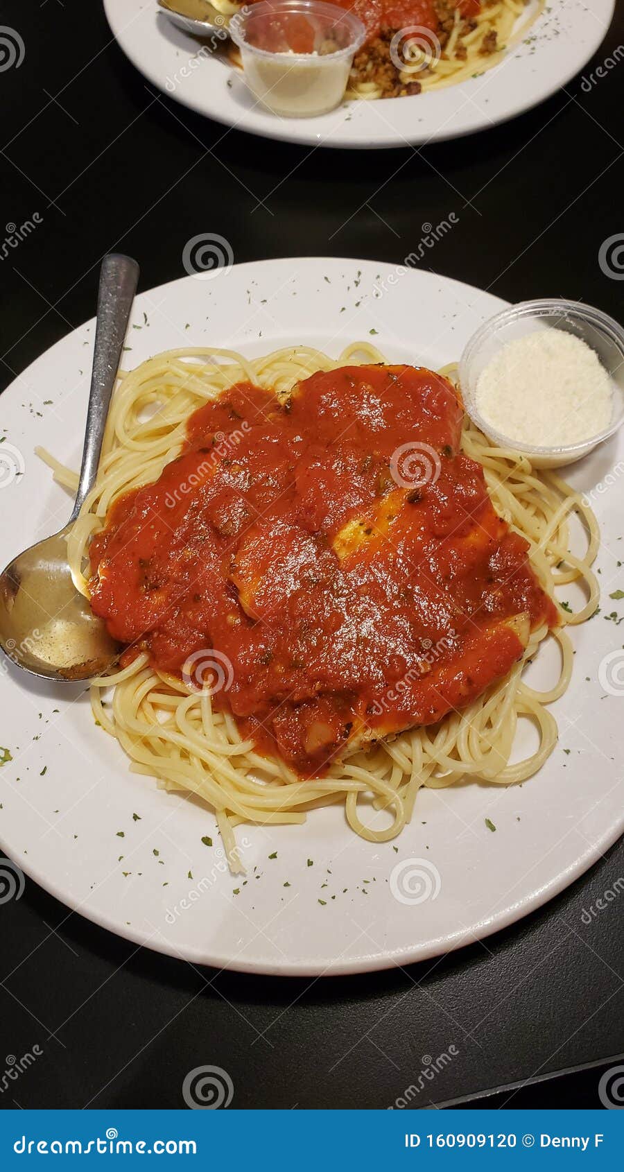 Spaghetti at restaurant stock photo. Image of spoon - 160909120
