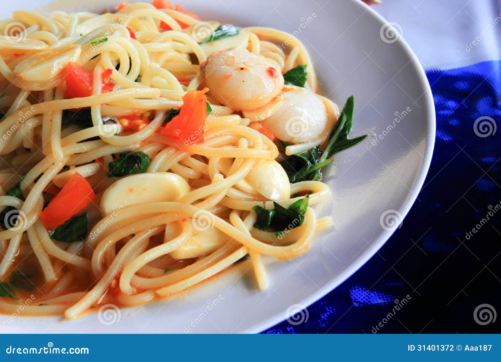 Spaghetti with Shell and Garlic Stock Photo - Image of closeup, cooking ...