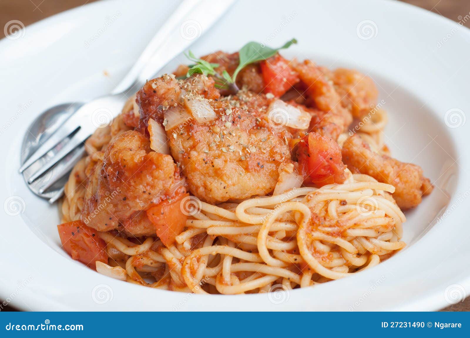 Spaghetti with Spicy Fried Fish on Sauce Stock Photo - Image of sauce ...