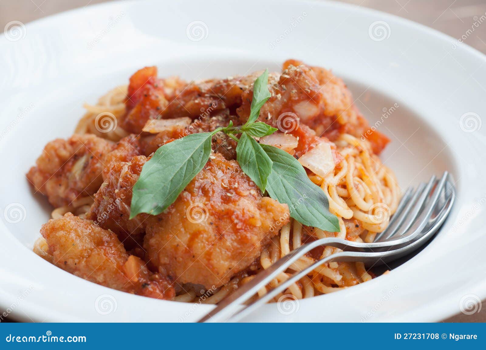 Spaghetti with Spicy Fried Fish on Sauce Stock Photo - Image of sauce ...